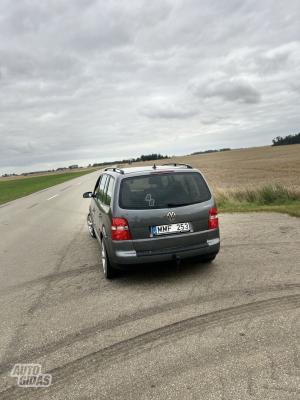Grey Volkswagen Touran 2006 in Joniskis, with an engine capacity of 2.00 L and mileage of 253 thousand km for 1700 €, photo 9 on AUTOMOTO.COM.LV