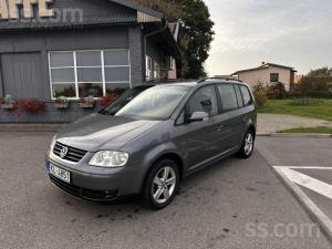 Grey Volkswagen Touran 2006 in Liepaja, with an engine capacity of 1.90 L and mileage of 227 thousand km for 2400 €, photo 3 on AUTOMOTO.COM.LV