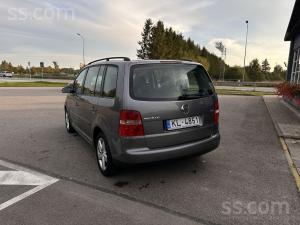 Grey Volkswagen Touran 2006 in Liepaja, with an engine capacity of 1.90 L and mileage of 227 thousand km for 2400 €, photo 6 on AUTOMOTO.COM.LV