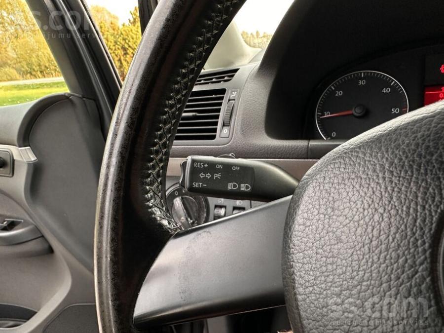 Grey Volkswagen Touran 2006 in Liepaja, with an engine capacity of 1.90 L and mileage of 227 thousand km for 2400 €, photo 10 on AUTOMOTO.COM.LV