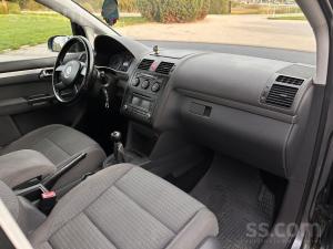 Grey Volkswagen Touran 2006 in Liepaja, with an engine capacity of 1.90 L and mileage of 227 thousand km for 2400 €, photo 12 on AUTOMOTO.COM.LV
