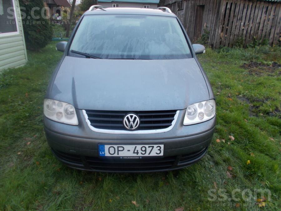 Grey Volkswagen Touran 2006 in Preili, with an engine capacity of 1.90 L and mileage of 332 thousand km for 1700 €, photo 8 on AUTOMOTO.COM.LV