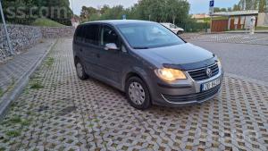 Grey Volkswagen Touran 2007 in Ventspils, with an engine capacity of 1.90 L and mileage of 333 thousand km for 10590 €, photo 1 on AUTOMOTO.COM.LV