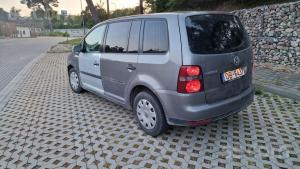 Grey Volkswagen Touran 2007 in Ventspils, with an engine capacity of 1.90 L and mileage of 333 thousand km for 10590 €, photo 2 on AUTOMOTO.COM.LV