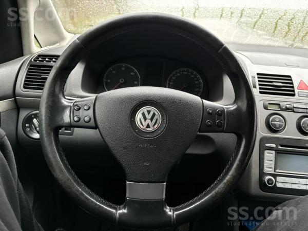 Grey Volkswagen Touran 2007 in Riga, with an engine capacity of 2.00 L and mileage of 460 thousand km for 2050 €, photo 9 on AUTOMOTO.COM.LV