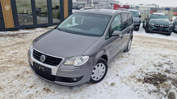 Grey Volkswagen Touran 2007 in Marijampole, with an engine capacity of 1.90 L and mileage of 264 thousand km for 3490 €, photo 1 on AUTOMOTO.COM.LV