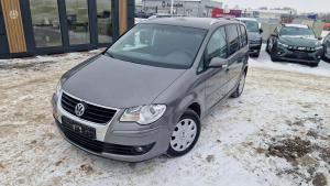 Pelēks Volkswagen Touran 2007 Marijampole, ar dzinēja tilpumu 1.90 L un nobraukumu 264 tūkst. km par 3490 €, foto  vietnē AUTOMOTO.COM.LV