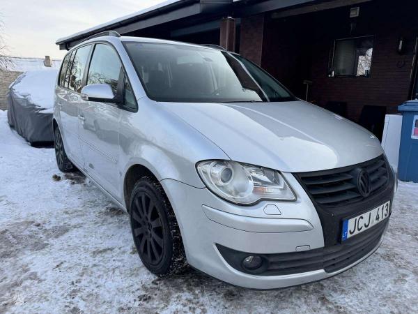 Pelēks Volkswagen Touran 2007 Kauņa, ar dzinēja tilpumu 1.90 L un nobraukumu 307 tūkst. km par 2300 €, foto 1 vietnē AUTOMOTO.COM.LV