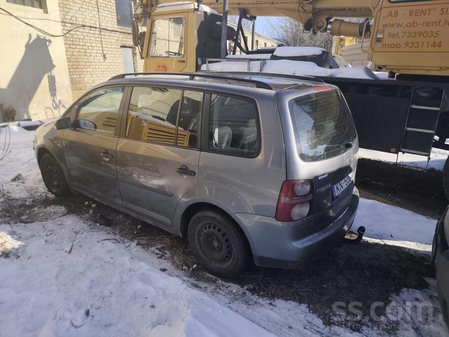 Grey Volkswagen Touran 2007 in Riga, with an engine capacity of 1.90 L and mileage of 343 thousand km for 1500 €, photo 2 on AUTOMOTO.COM.LV