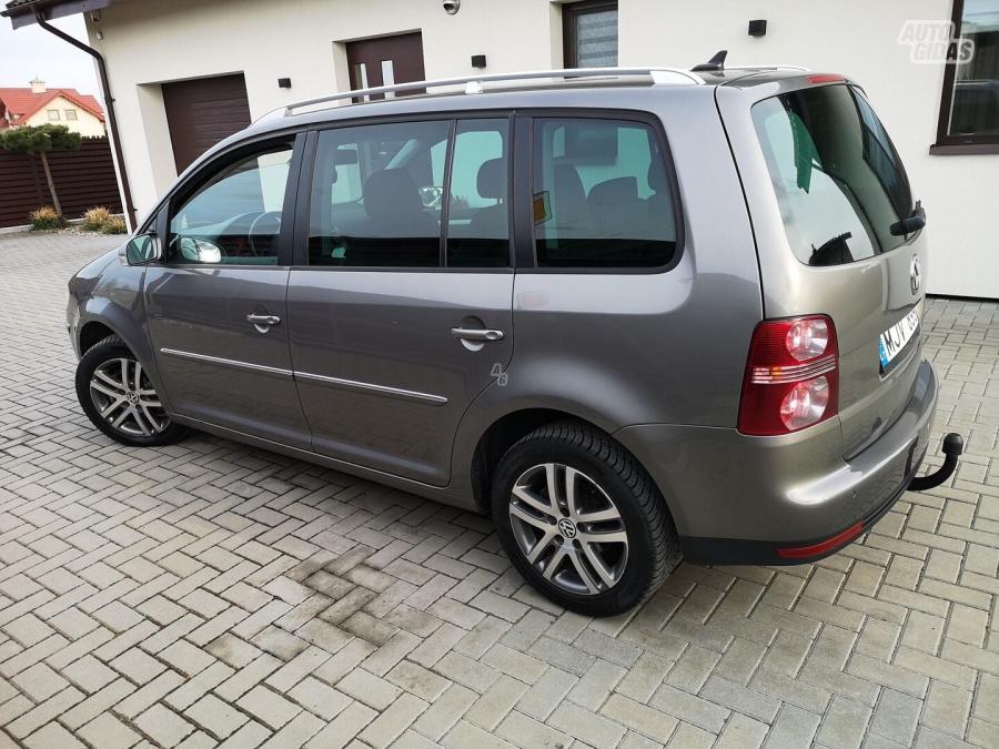 Grey Volkswagen Touran 2007 in Jurbarkas, with an engine capacity of 2.00 L and mileage of 270 thousand km for 3200 €, photo 5 on AUTOMOTO.COM.LV
