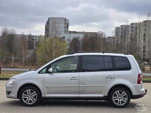 Grey Volkswagen Touran 2007 in Vilnius, with an engine capacity of 2.00 L and mileage of 363 thousand km for 1600 €, photo 4 on AUTOMOTO.COM.LV