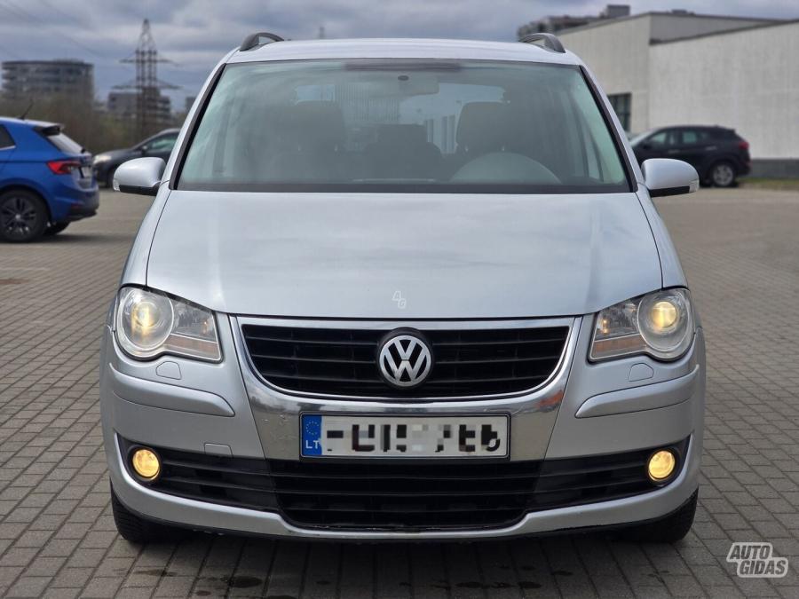 Grey Volkswagen Touran 2007 in Vilnius, with an engine capacity of 2.00 L and mileage of 363 thousand km for 1600 €, photo 9 on AUTOMOTO.COM.LV