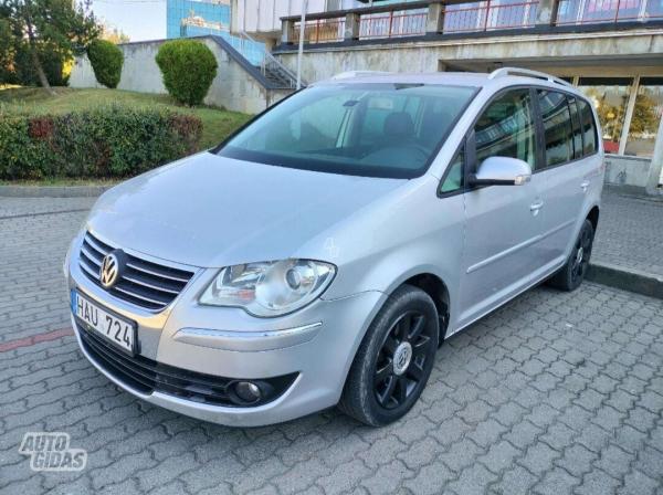 Grey Volkswagen Touran 2007 in Alytus, with an engine capacity of 2.00 L and mileage of 343 thousand km for 2300 €, photo 8 on AUTOMOTO.COM.LV