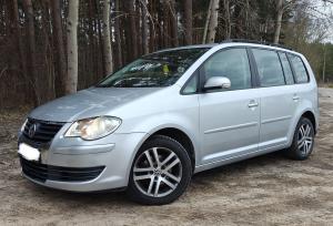 Pelēks Volkswagen Touran 2007 Viļņa, ar dzinēja tilpumu 1.40 L un nobraukumu 193 tūkst. km par 2350 €, foto  vietnē AUTOMOTO.COM.LV