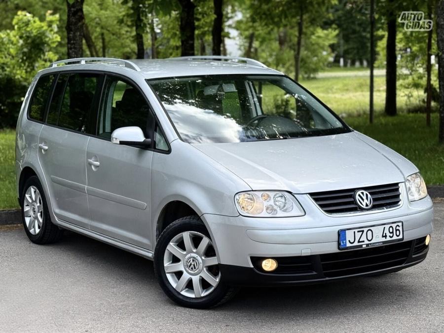 Grey Volkswagen Touran 2007 in Kaunas, with an engine capacity of 2.00 L and mileage of 262 thousand km for 1650 €, photo 1 on AUTOMOTO.COM.LV