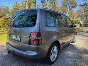 Grey Volkswagen Touran 2007 in Riga, with an engine capacity of 2.00 L and mileage of 360 thousand km for 1850 €, photo 5 on AUTOMOTO.COM.LV