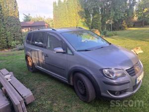 Grey Volkswagen Touran 2007 in Riga, with an engine capacity of 2.00 L and mileage of 430 thousand km for 2200 €, photo  on AUTOMOTO.COM.LV