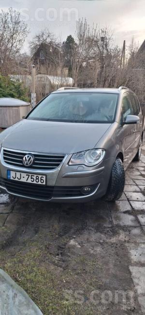 Grey Volkswagen Touran 2007 in Ogre, with an engine capacity of 1.90 L and mileage of 371 thousand km for 1500 €, photo  on AUTOMOTO.COM.LV