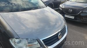 Grey Volkswagen Touran 2007 in Riga, with an engine capacity of 1.90 L and mileage of 248 thousand km for 2100 €, photo 14 on AUTOMOTO.COM.LV