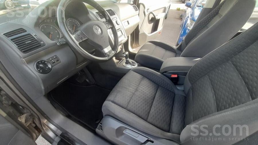 Grey Volkswagen Touran 2007 in Riga, with an engine capacity of 1.90 L and mileage of 248 thousand km for 2100 €, photo 16 on AUTOMOTO.COM.LV