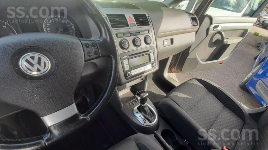 Grey Volkswagen Touran 2007 in Riga, with an engine capacity of 1.90 L and mileage of 248 thousand km for 2100 €, photo 18 on AUTOMOTO.COM.LV
