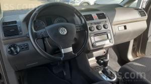 Grey Volkswagen Touran 2007 in Riga, with an engine capacity of 1.90 L and mileage of 248 thousand km for 2100 €, photo 23 on AUTOMOTO.COM.LV