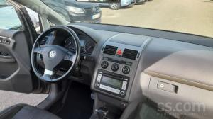 Grey Volkswagen Touran 2007 in Riga, with an engine capacity of 1.90 L and mileage of 248 thousand km for 2100 €, photo 26 on AUTOMOTO.COM.LV