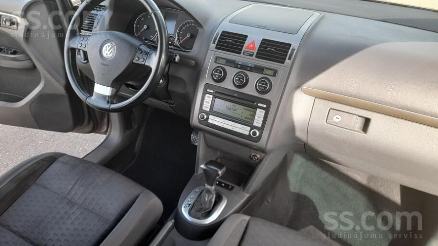Grey Volkswagen Touran 2007 in Riga, with an engine capacity of 1.90 L and mileage of 248 thousand km for 2100 €, photo 27 on AUTOMOTO.COM.LV