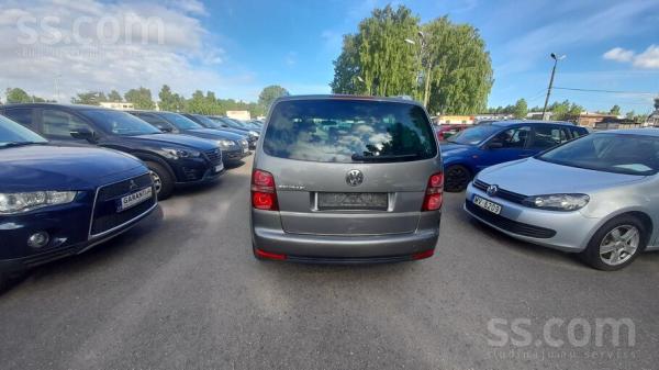 Grey Volkswagen Touran 2007 in Riga, with an engine capacity of 1.90 L and mileage of 248 thousand km for 2100 €, photo 7 on AUTOMOTO.COM.LV