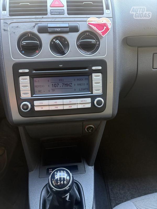 Grey Volkswagen Touran 2007 in Vilnius, with an engine capacity of 1.40 L and mileage of 232 thousand km for 1999 €, photo 8 on AUTOMOTO.COM.LV