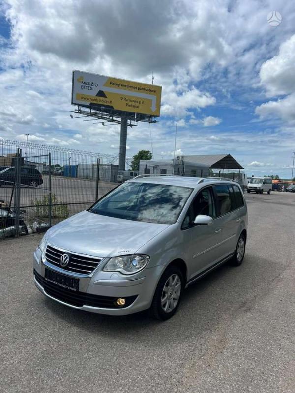 Grey Volkswagen Touran 2007 in Marijampole, with an engine capacity of 1.39 L and mileage of 215 thousand km for 2650 €, photo 1 on AUTOMOTO.COM.LV
