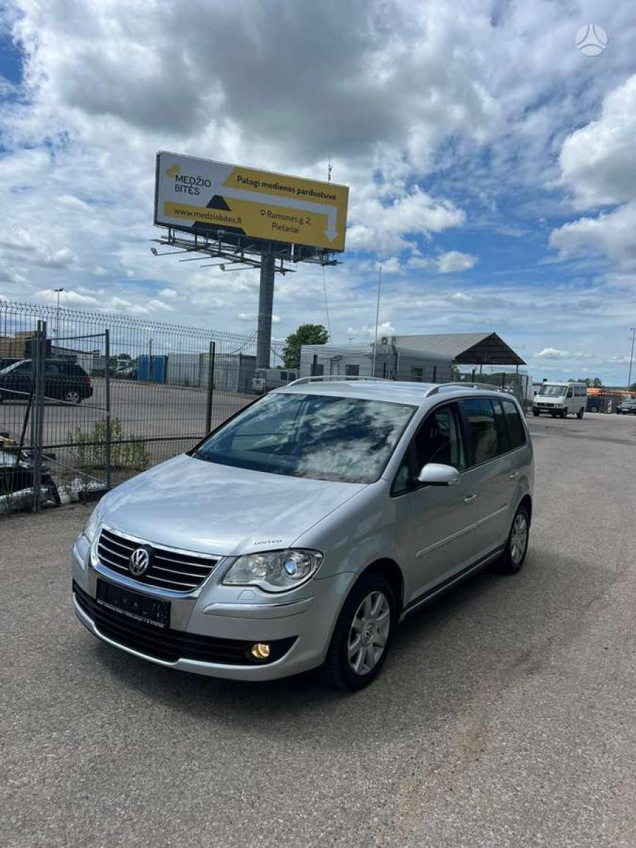 Grey Volkswagen Touran 2007 in Marijampole, with an engine capacity of 1.39 L and mileage of 215 thousand km for 2650 €, photo 1 on AUTOMOTO.COM.LV