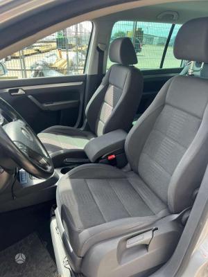Grey Volkswagen Touran 2007 in Marijampole, with an engine capacity of 1.39 L and mileage of 215 thousand km for 2650 €, photo 12 on AUTOMOTO.COM.LV