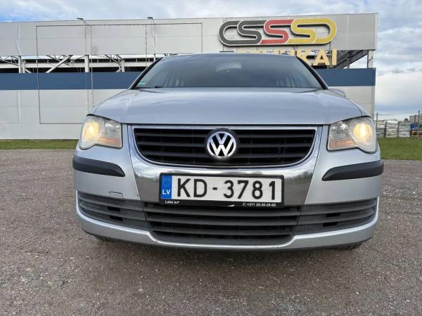 Grey Volkswagen Touran 2007 in Daugavpils, with an engine capacity of 1.90 L and mileage of 344 thousand km for 2400 €, photo 8 on AUTOMOTO.COM.LV