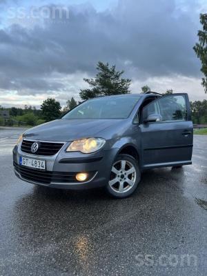 Pelēks Volkswagen Touran 2007 Gulbene, ar dzinēja tilpumu 1.90 L un nobraukumu 400 tūkst. km par 1950 €, foto 4 vietnē AUTOMOTO.COM.LV