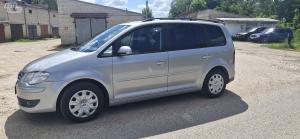Grey Volkswagen Touran 2007 in Utena, with an engine capacity of 2.00 L and mileage of 255 thousand km for 3450 €, photo 9 on AUTOMOTO.COM.LV