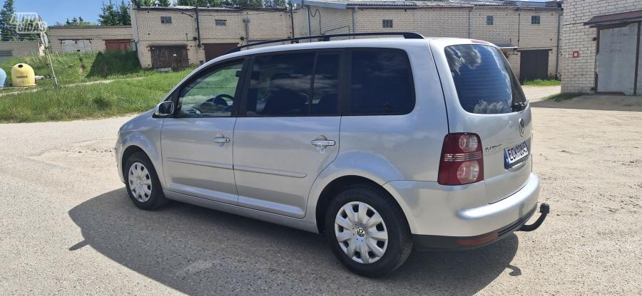 Grey Volkswagen Touran 2007 in Utena, with an engine capacity of 2.00 L and mileage of 255 thousand km for 3450 €, photo 12 on AUTOMOTO.COM.LV
