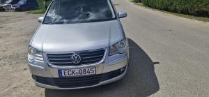 Grey Volkswagen Touran 2007 in Utena, with an engine capacity of 2.00 L and mileage of 255 thousand km for 3450 €, photo 14 on AUTOMOTO.COM.LV
