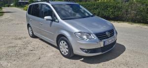Grey Volkswagen Touran 2007 in Utena, with an engine capacity of 2.00 L and mileage of 255 thousand km for 3450 €, photo 17 on AUTOMOTO.COM.LV