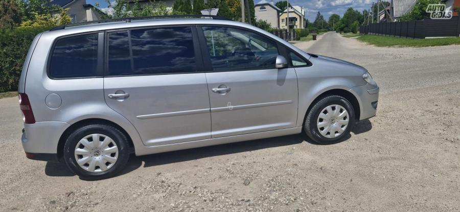 Grey Volkswagen Touran 2007 in Utena, with an engine capacity of 2.00 L and mileage of 255 thousand km for 3450 €, photo 22 on AUTOMOTO.COM.LV