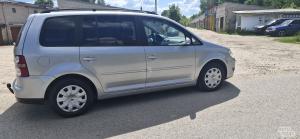 Grey Volkswagen Touran 2007 in Utena, with an engine capacity of 2.00 L and mileage of 255 thousand km for 3450 €, photo 26 on AUTOMOTO.COM.LV