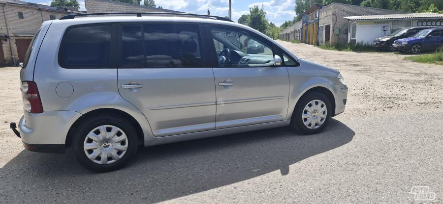 Grey Volkswagen Touran 2007 in Utena, with an engine capacity of 2.00 L and mileage of 255 thousand km for 3450 €, photo 26 on AUTOMOTO.COM.LV
