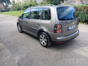 Grey Volkswagen Touran 2007 in Ludza, with an engine capacity of 1.90 L and mileage of 220 thousand km for 4390 €, photo 3 on AUTOMOTO.COM.LV