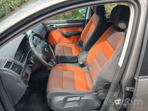Grey Volkswagen Touran 2007 in Ludza, with an engine capacity of 1.90 L and mileage of 220 thousand km for 4390 €, photo 10 on AUTOMOTO.COM.LV