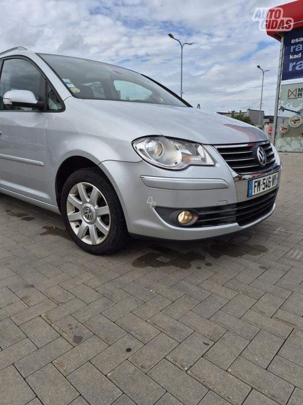 Grey Volkswagen Touran 2007 in Telschi, with an engine capacity of 2.00 L and mileage of 242 thousand km for 3800 €, photo 6 on AUTOMOTO.COM.LV