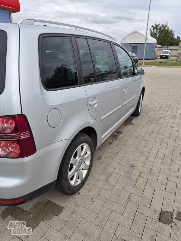 Grey Volkswagen Touran 2007 in Telschi, with an engine capacity of 2.00 L and mileage of 242 thousand km for 3800 €, photo 7 on AUTOMOTO.COM.LV