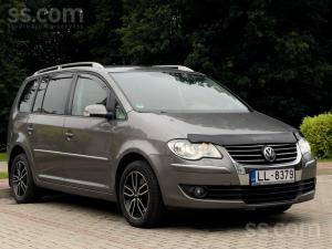 Grey Volkswagen Touran 2007 in Jelgava, with an engine capacity of 2.00 L and mileage of 278 thousand km for 2900 €, photo 8 on AUTOMOTO.COM.LV