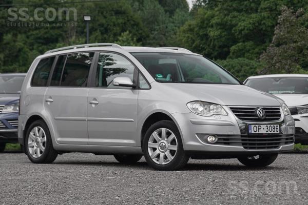 Pelēks Volkswagen Touran 2007 Rīga, ar dzinēja tilpumu 2.00 L un nobraukumu 290 tūkst. km par 4590 €, foto 2 vietnē AUTOMOTO.COM.LV