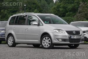 Grey Volkswagen Touran 2007 in Riga, with an engine capacity of 2.00 L and mileage of 290 thousand km for 4590 €, photo 3 on AUTOMOTO.COM.LV