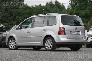 Grey Volkswagen Touran 2007 in Riga, with an engine capacity of 2.00 L and mileage of 290 thousand km for 4590 €, photo 4 on AUTOMOTO.COM.LV
